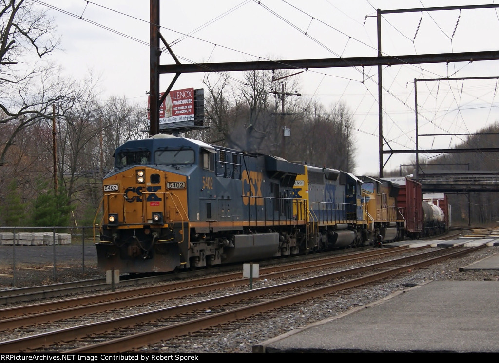 CSX Q438-09 With UP SD70M - 4/10/2011